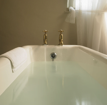 How to Properly Seal Off a Bathtub Overflow Like a Pro - SPRUCE BATH